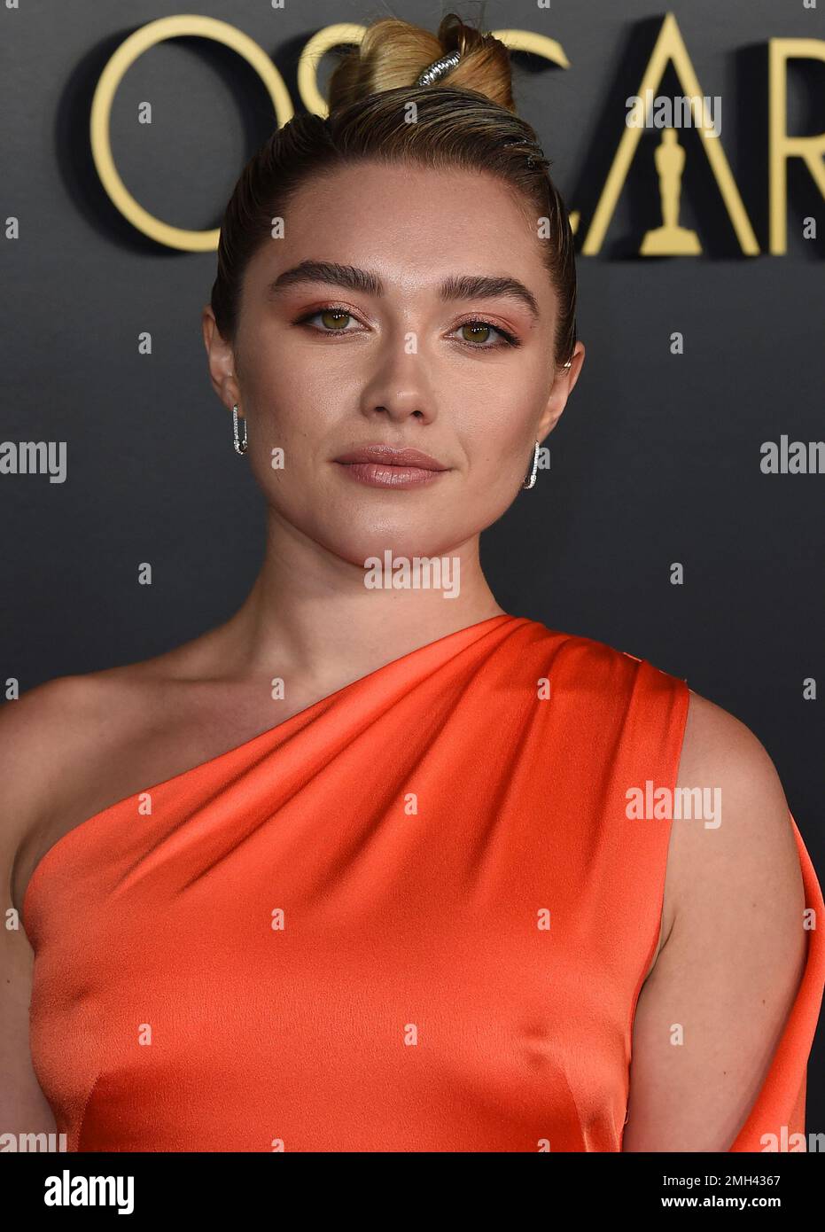 Florence Pugh arrives at the 92nd Academy Awards Nominees Luncheon at ...