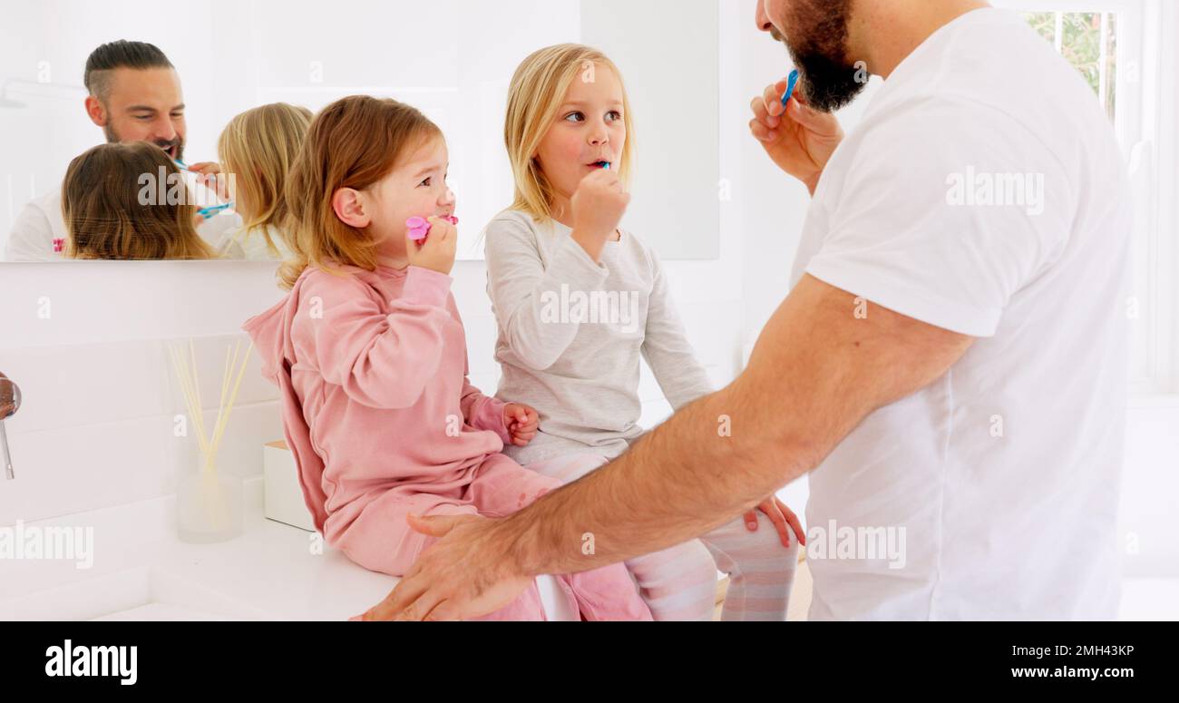 Brushing teeth, family and bathroom by children learning, cleaning and ...