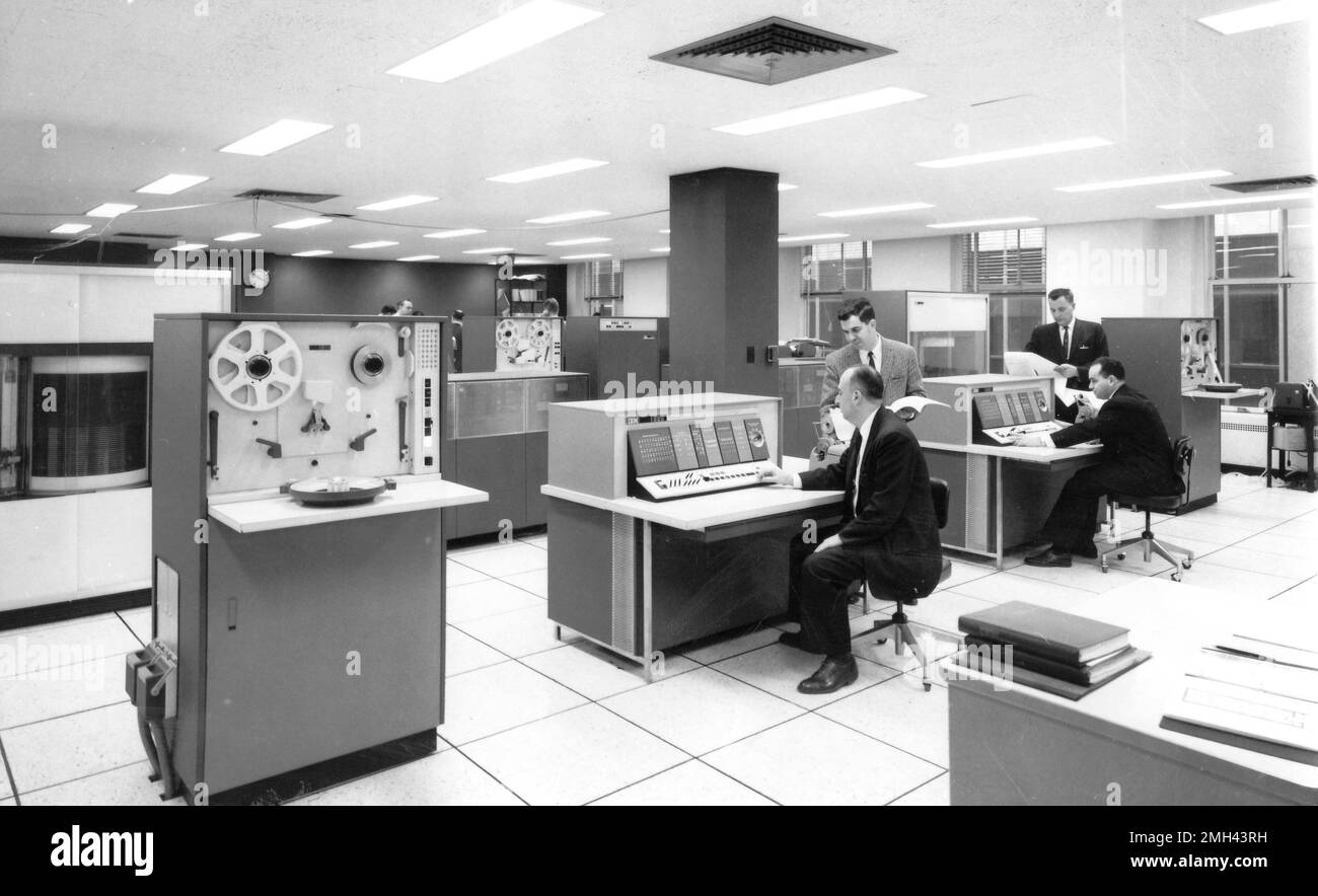 Staffers in the computer room at AP headquarters at Rockefeller Center ...