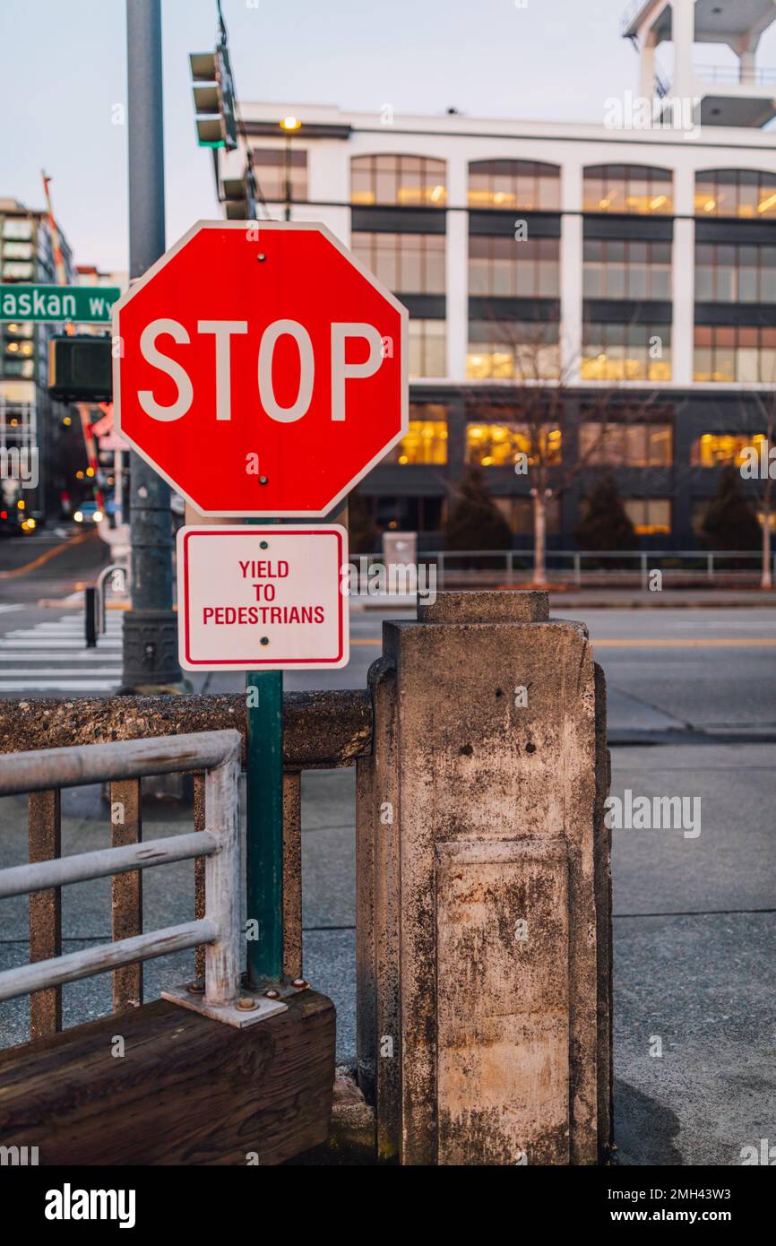 Stop sign on Alaskan Way in Seattle with "Yield to Pedestrians" sign at ...