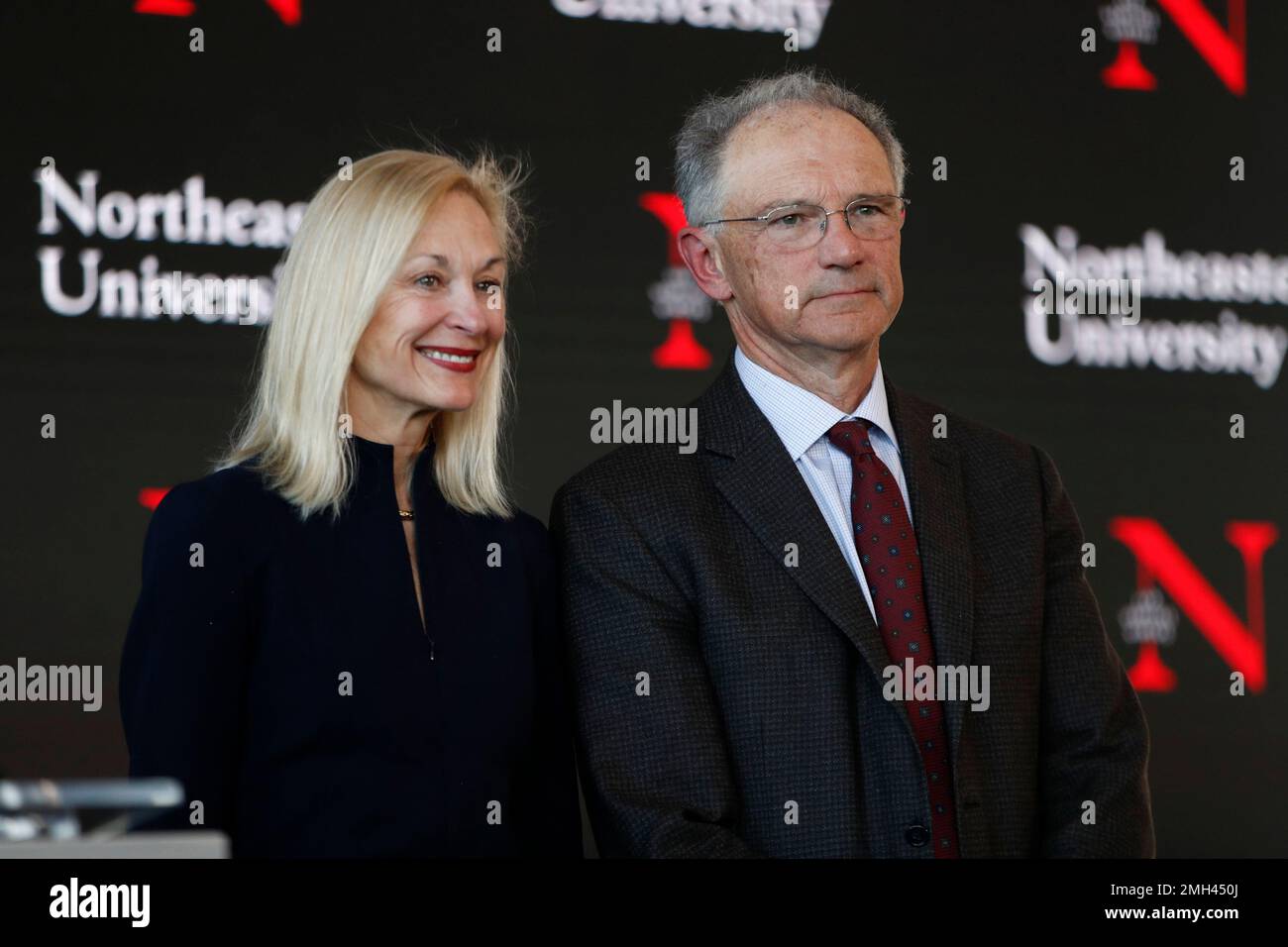 Barbara and David Roux attend a news conference to announce their ...