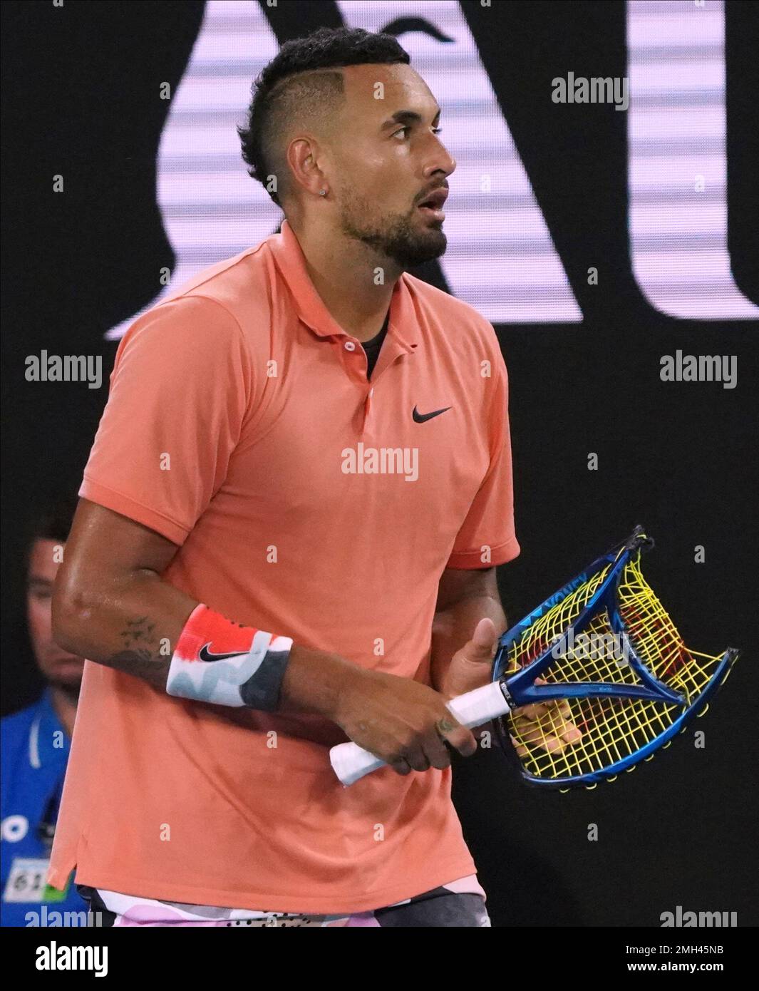 Australia's Nick Kyrgios walks with his smashed racket during his ...