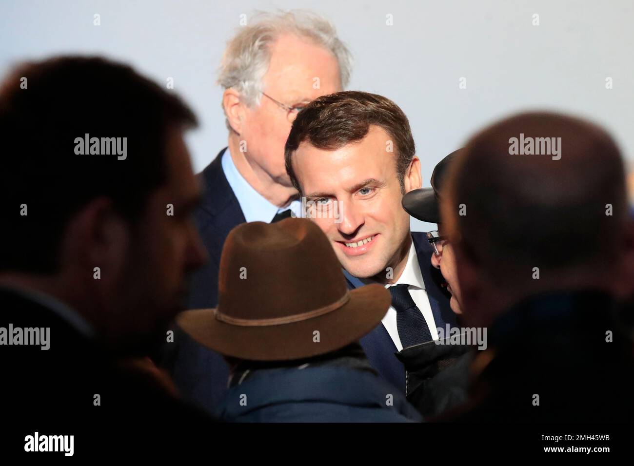 French President Emmanuel Macron, center, meets members of the Jewish ...