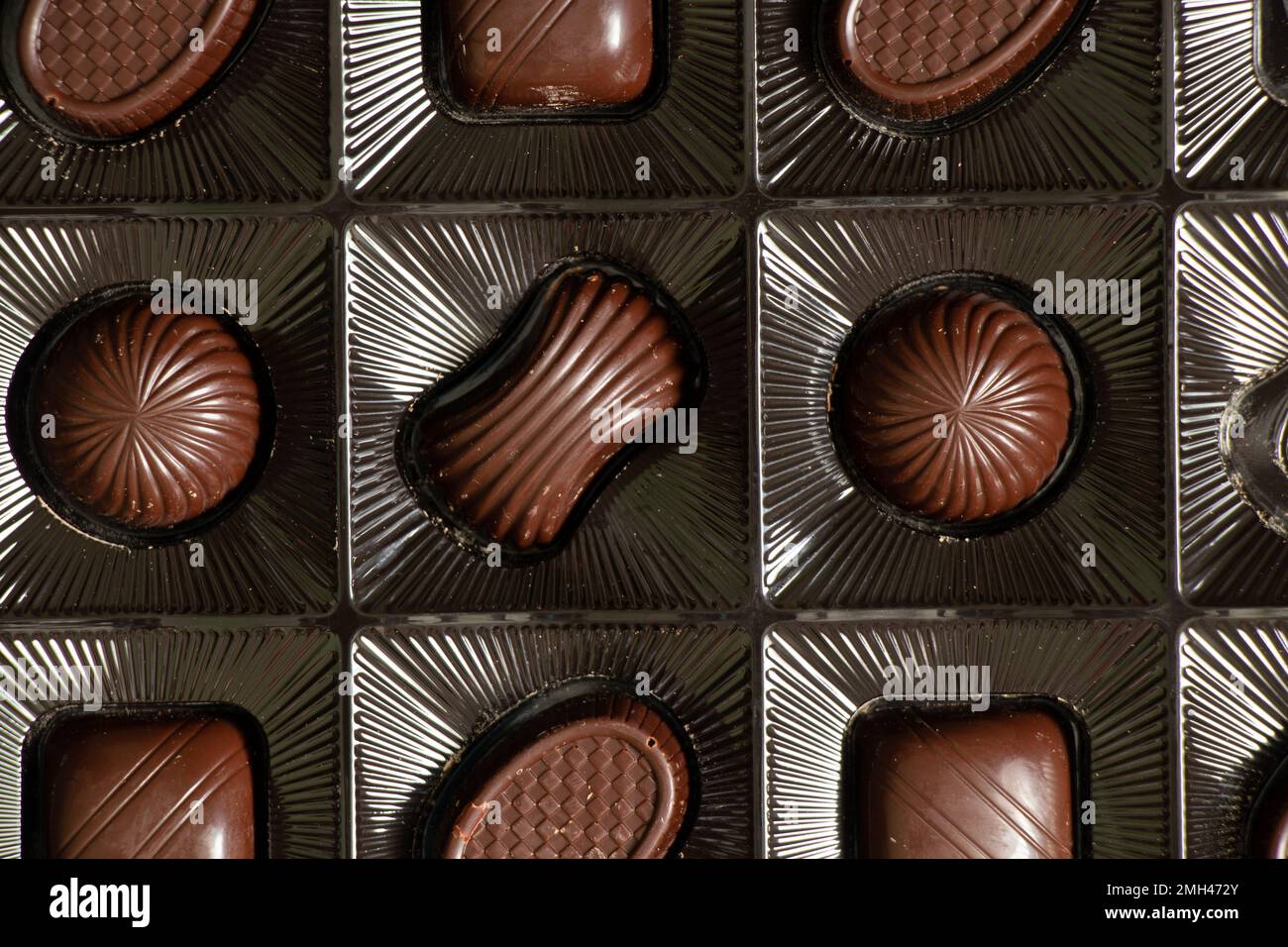 Broken chocolate in box hi-res stock photography and images - Alamy