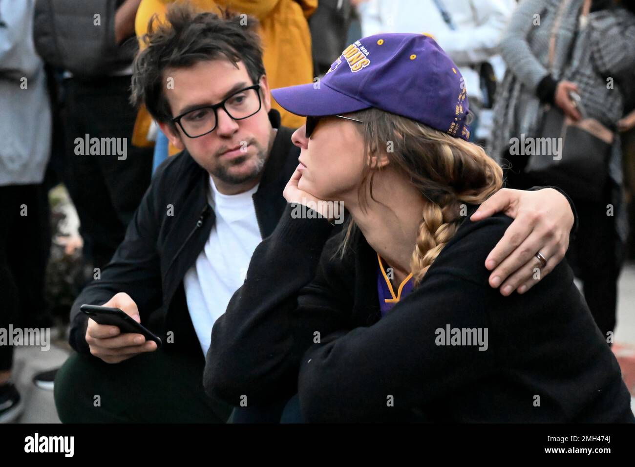 Chance Starling, left, comforts his wife Natasha Lloyd near the scene ...