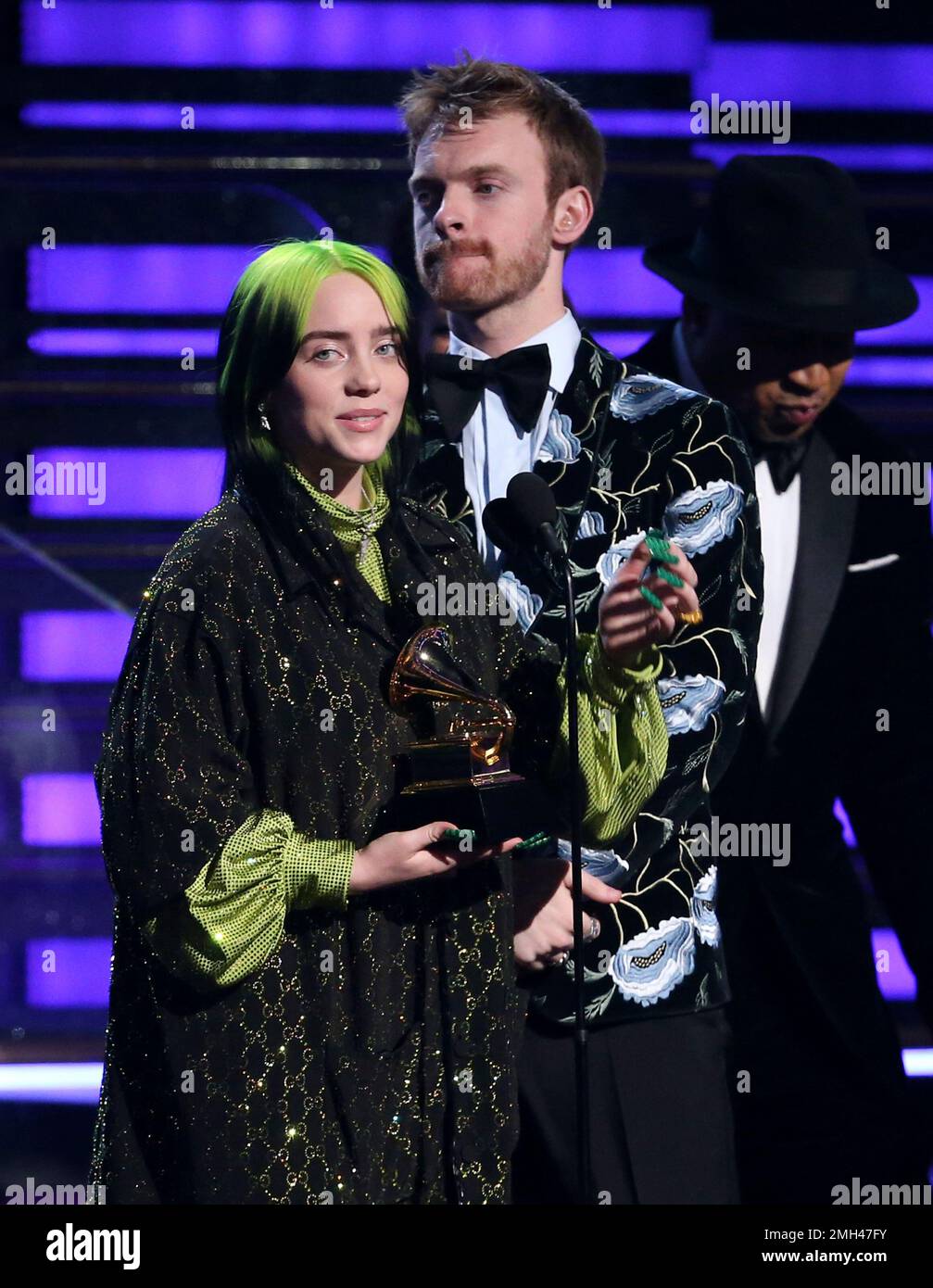 Billie Eilish, left, and Finneas O'Connell accept the award for album ... Billie Eilish, left, and Finneas O'Connell accept the award for album ...