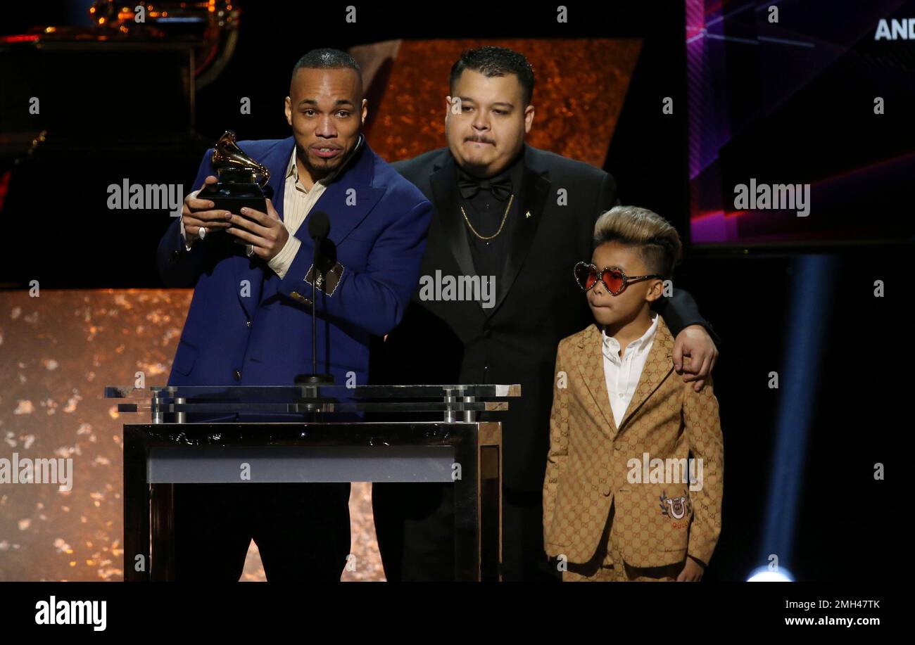 Anderson .Paak, far left, accepts the award for best R&B performance ...