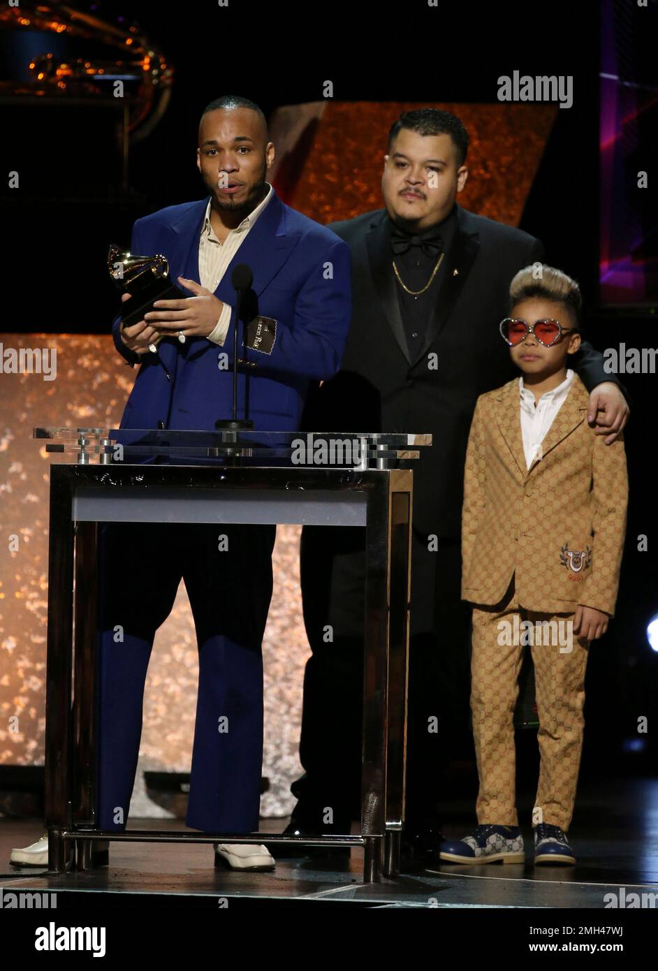 Anderson .Paak, far left, accepts the award for best R&B performance ...