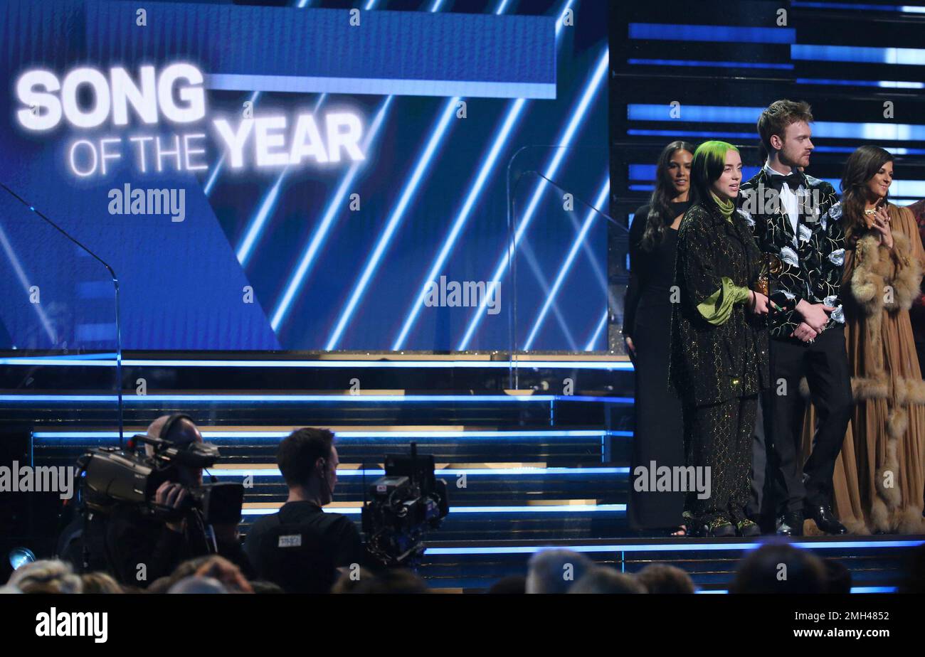 Billie Eilish, left, and Finneas O'Connell accept the award for song of ... Billie Eilish, left, and Finneas O'Connell accept the award for song of ...