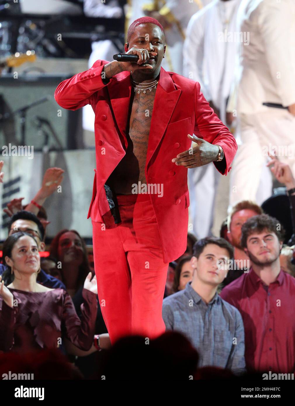 YG performs during a tribute in honor of the late Nipsey Hussle at the ...