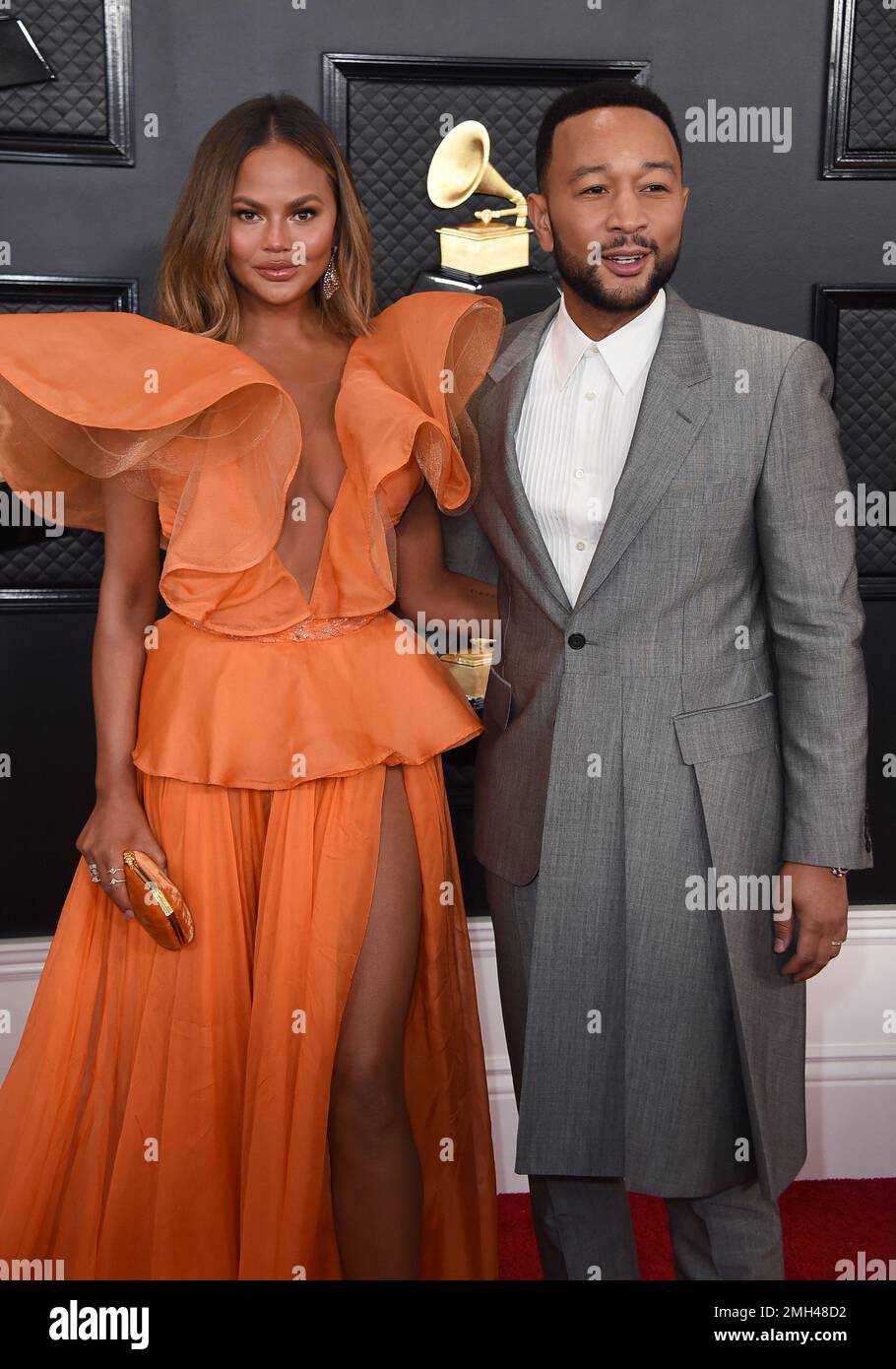 Chrissy Teigen, left, and John Legend arrive at the 62nd annual Grammy ...