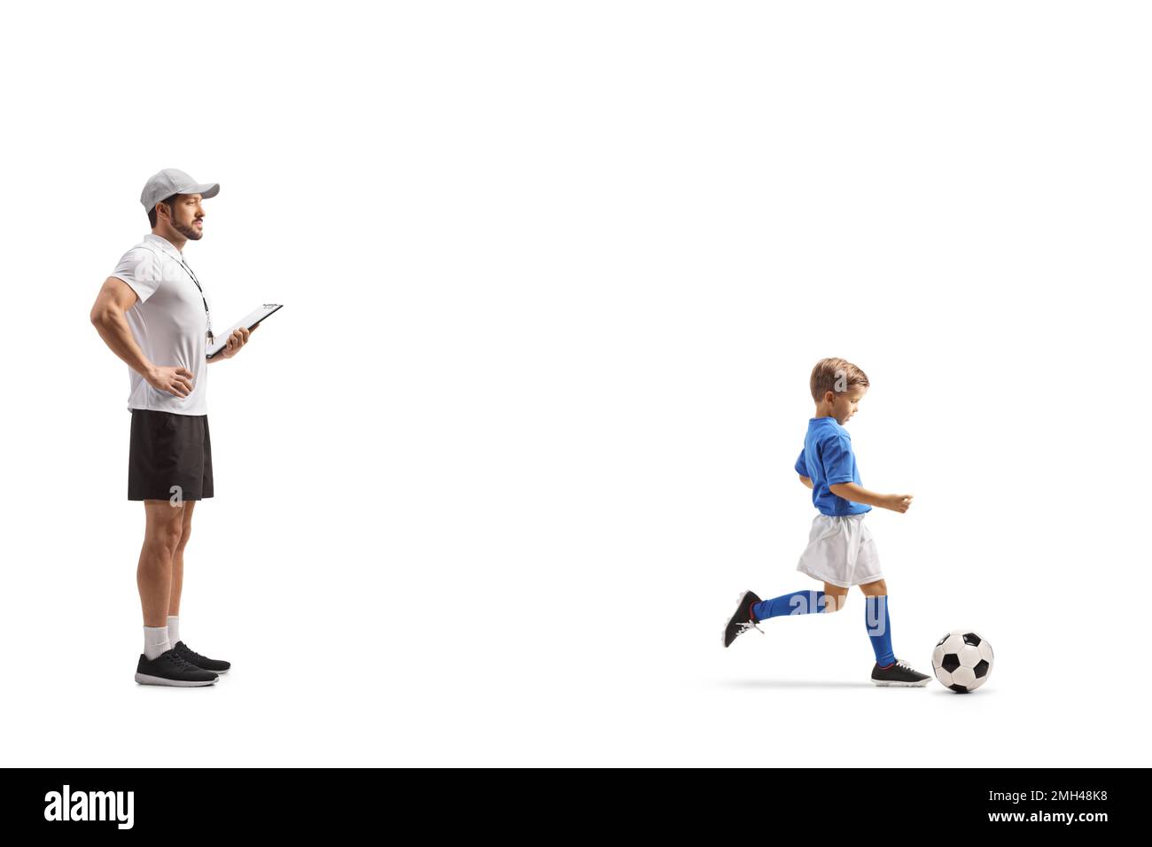 Coach watching a boy training football isolated on white background ...