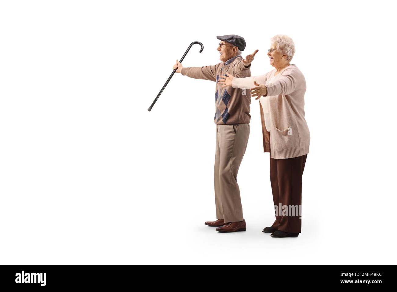 Elderly man and woman waiting with arms wide open isolated on white ...