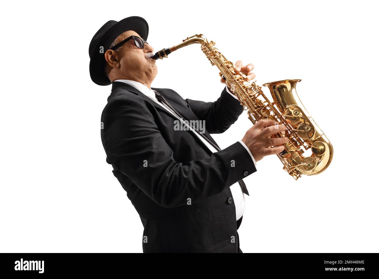 Profile shot of a mature elegant musician playing sax isolated on white ...