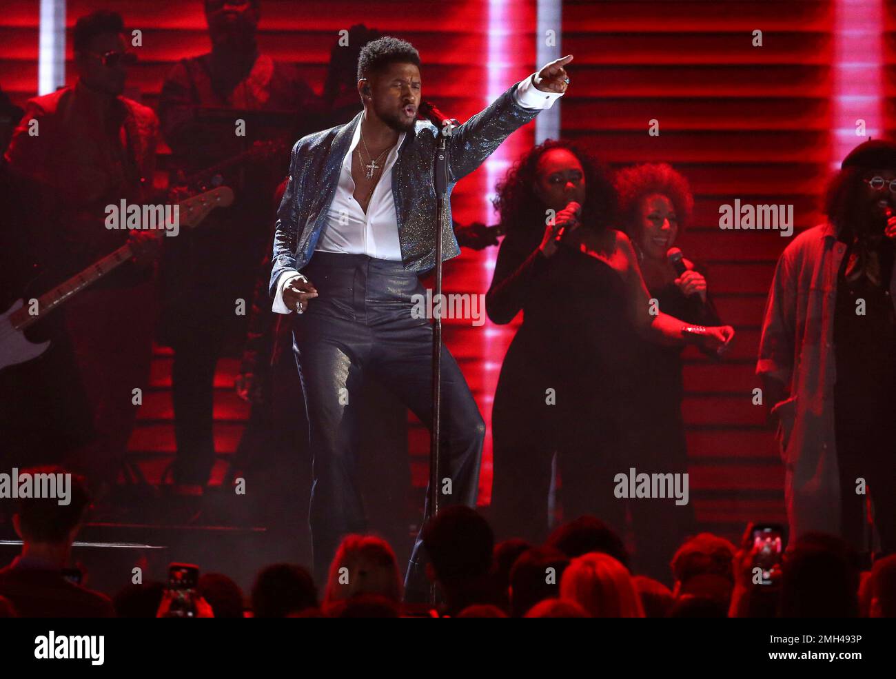 Usher performs during a Prince tribute at the 62nd annual Grammy Awards ...