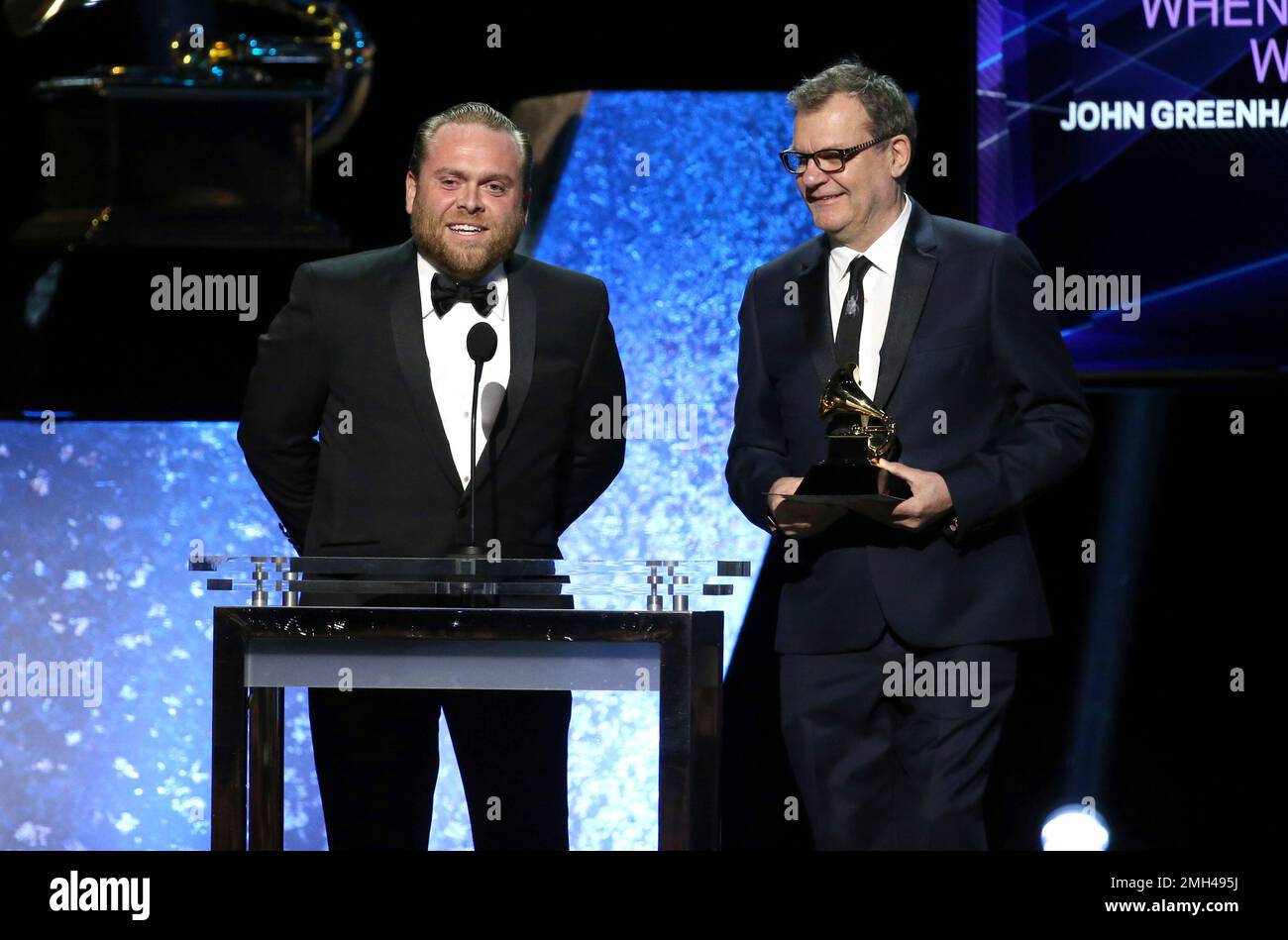 Rob Kinelski, left, and John Greenham accept the award for best ...