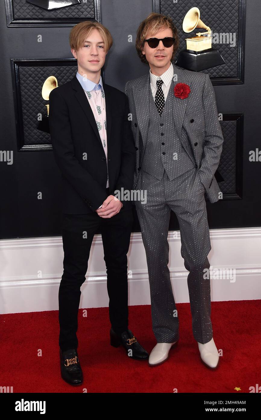 Cosimo Henri Hansen, left, and Beck arrive at the 62nd annual Grammy ...