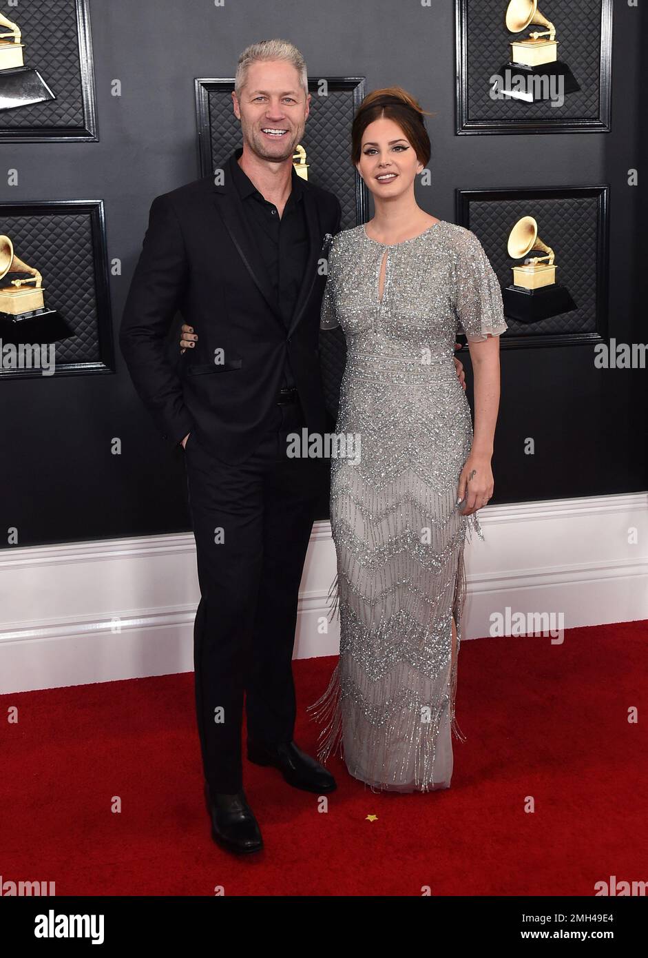 Sean Larkin, left, and Lana Del Rey arrive at the 62nd annual Grammy ...
