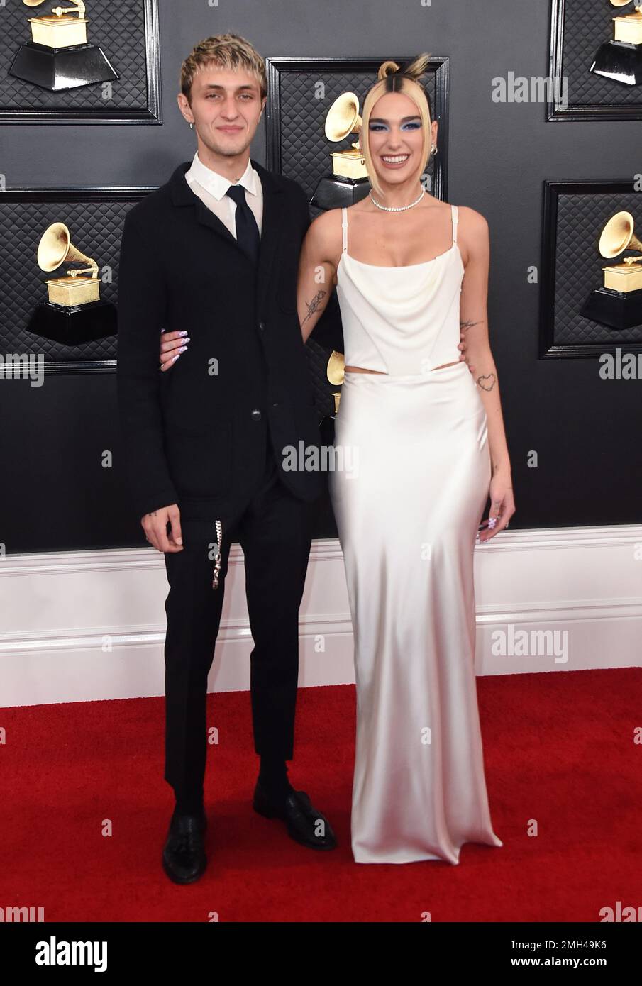 Anwar Hadid, left, and Dua Lipa arrive at the 62nd annual Grammy Awards ...