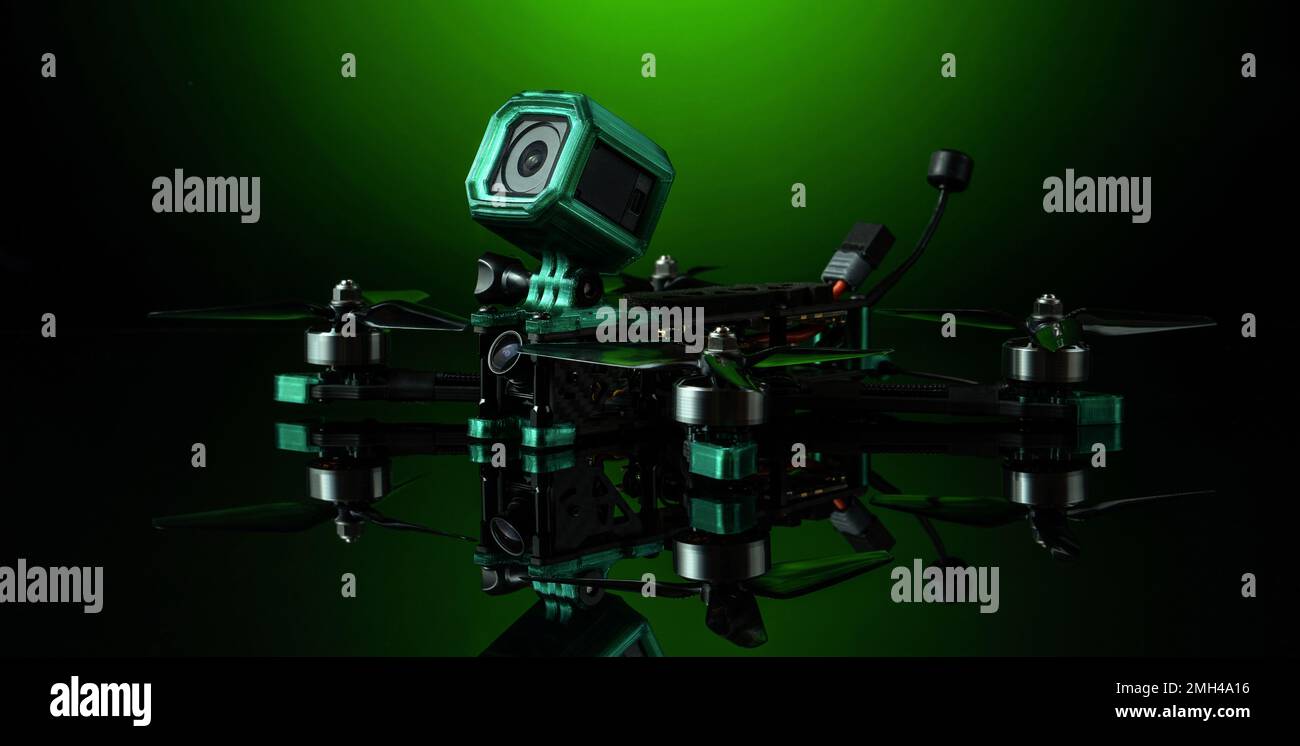 Modern FPV drone. Four-engine aircraft on the radio control. Drone for ...