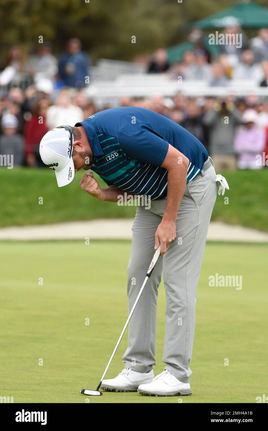 Marc Leishman of Australia pumps his fist on the 18th hole after ...