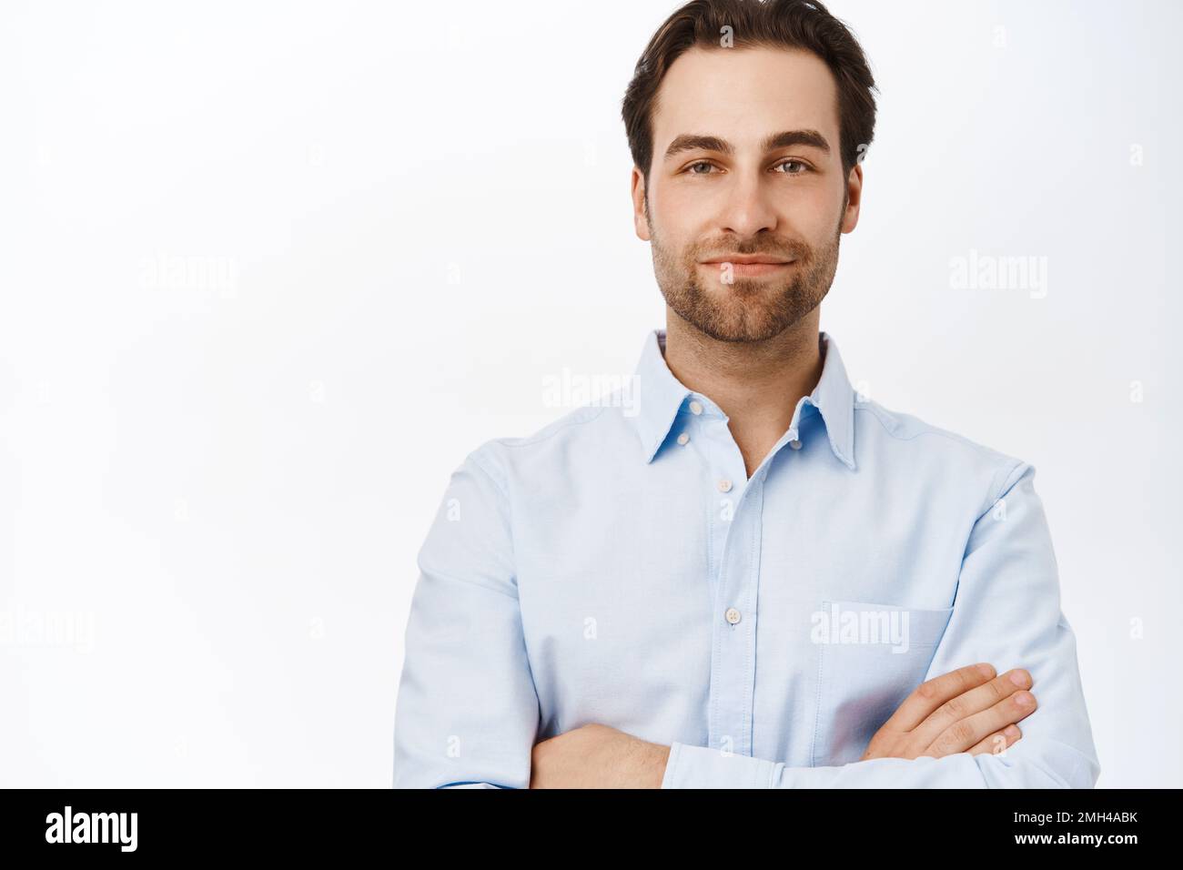 Young professionals. Smiling handsome businessman in confident power ...