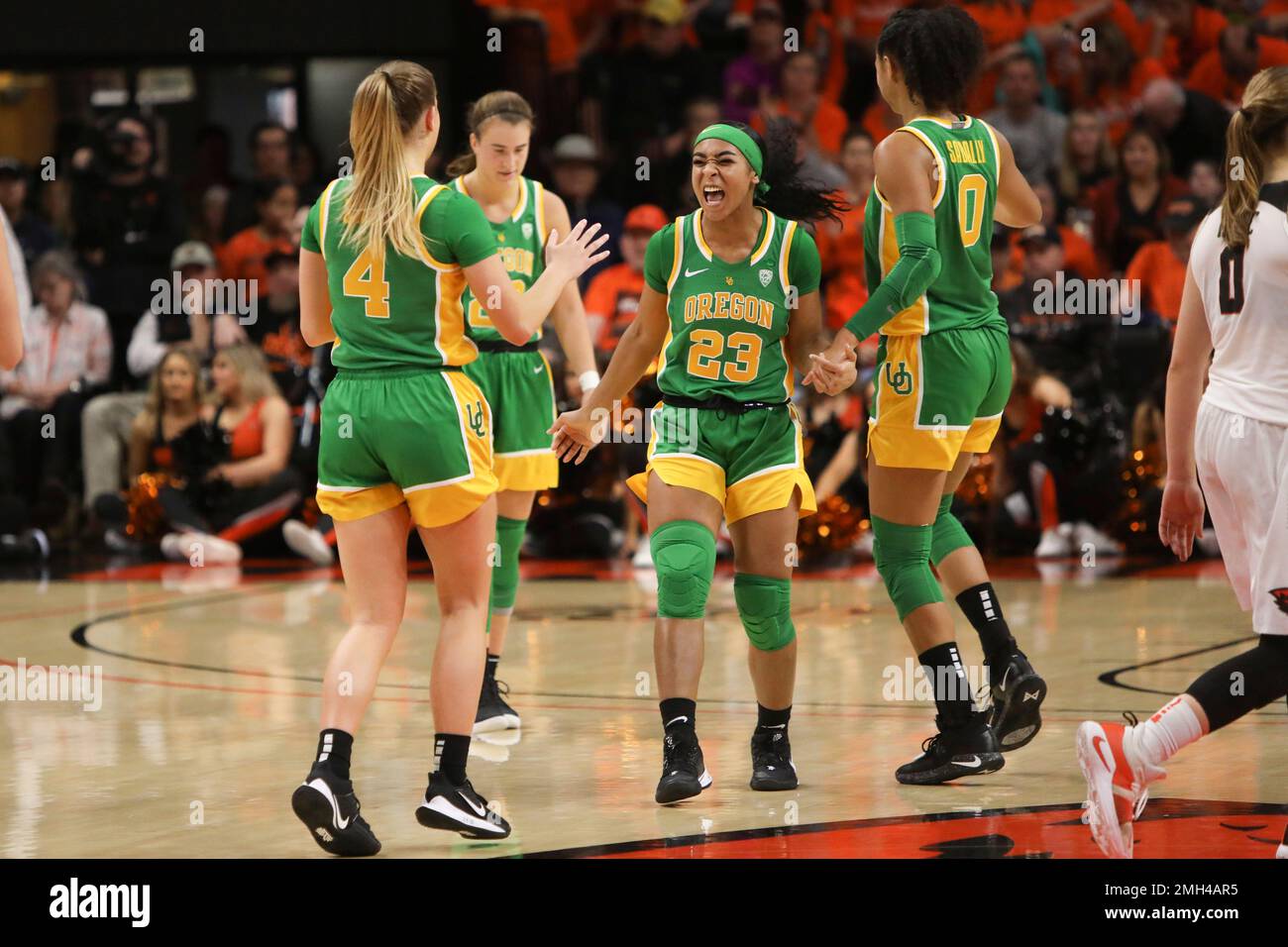 Oregon's Minyon Moore (23) celebrates with Jaz Shelley (4), Sabrina ...