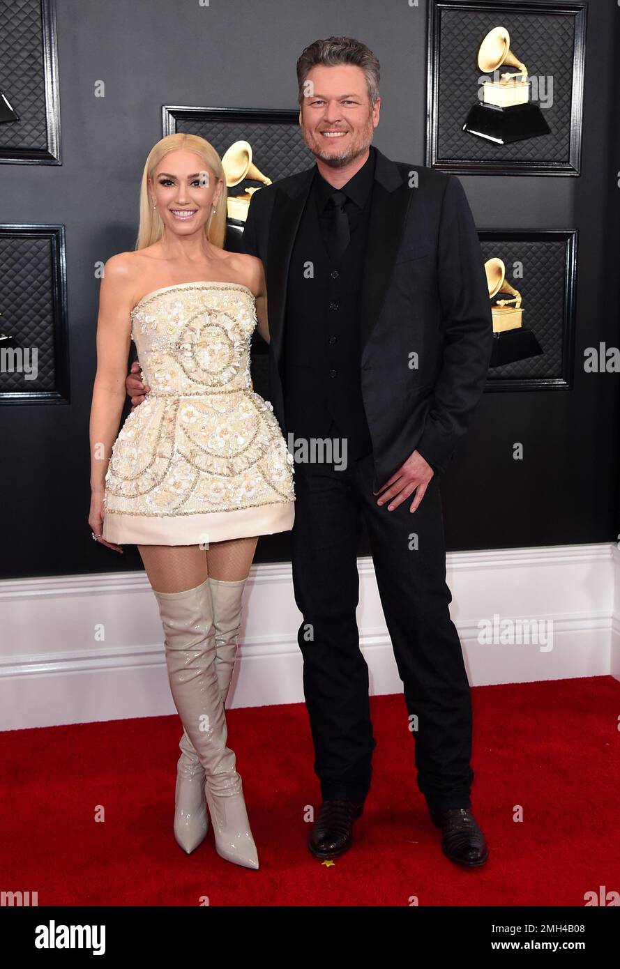 Gwen Stefani, left, and Blake Shelton arrive at the 62nd annual Grammy ...