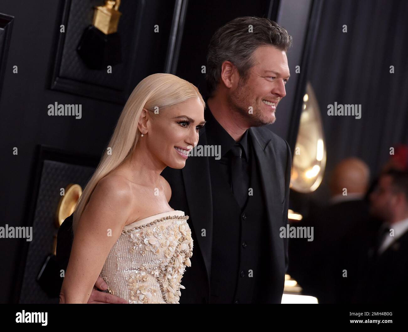 Gwen Stefani, left, and Blake Shelton arrive at the 62nd annual Grammy ...