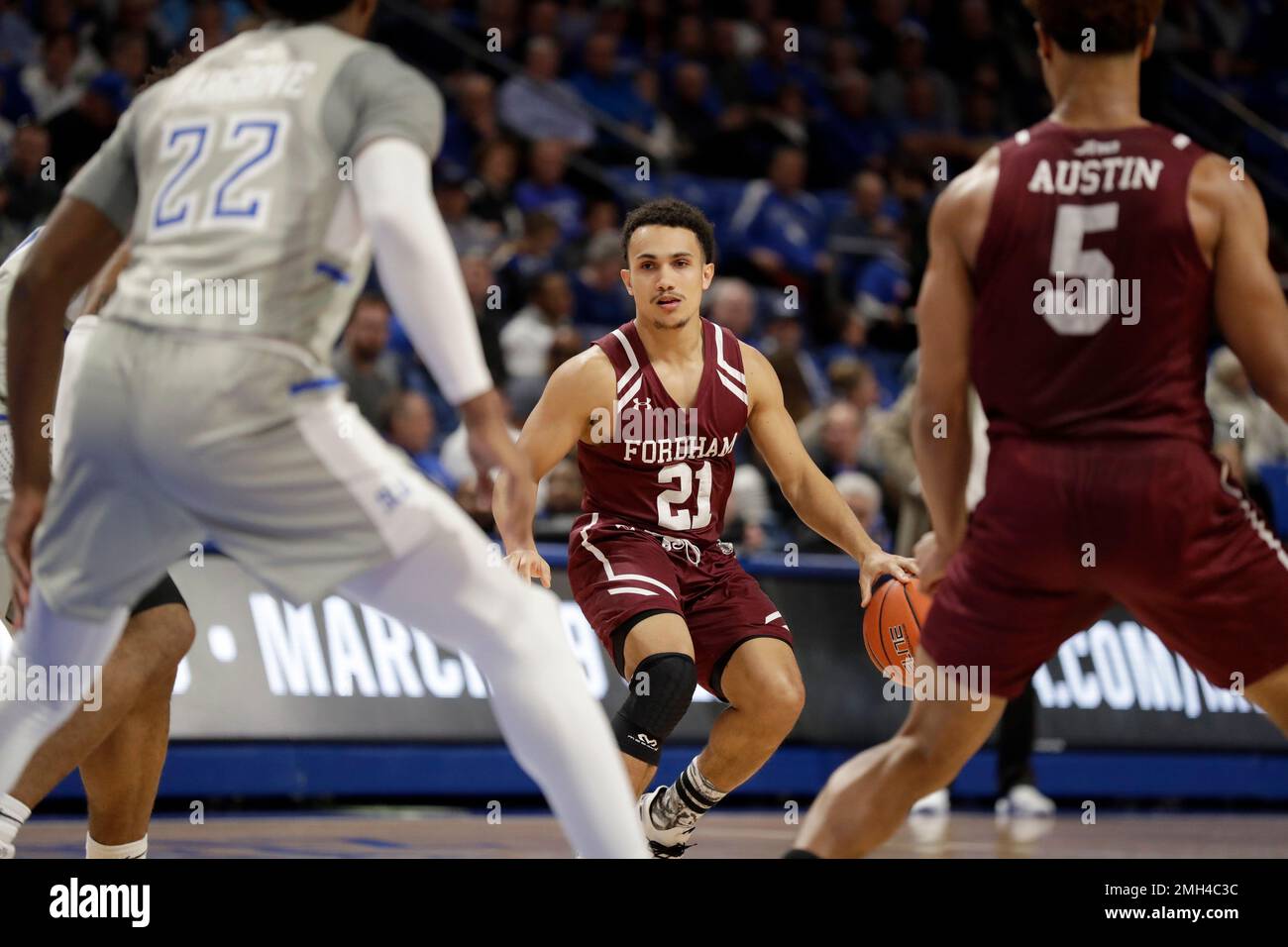 Fordham's Josh Colon (21) brings the ball down the court during the ...