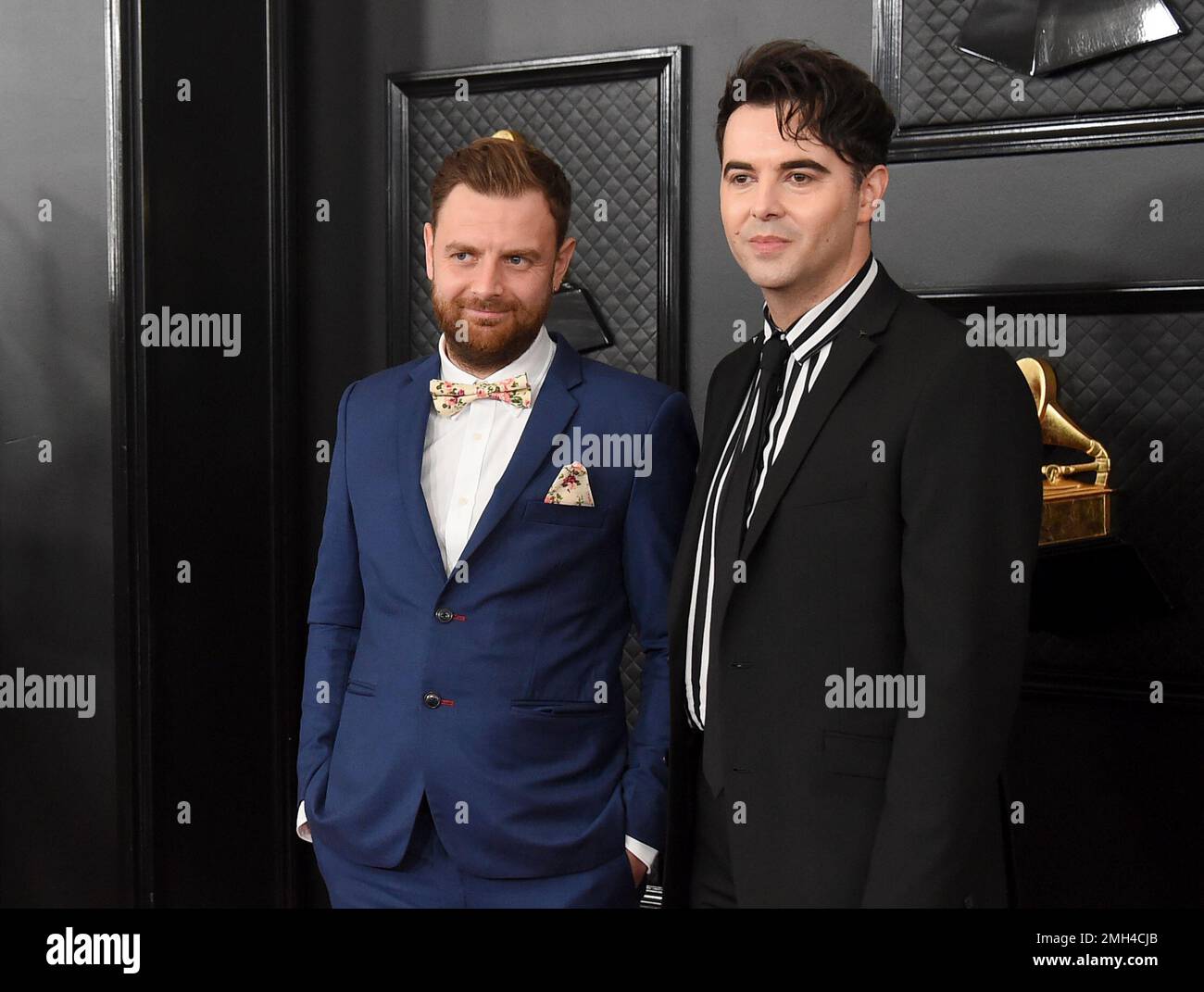 Kris Maher, left, and Andrew Batt arrive at the 62nd annual Grammy ...