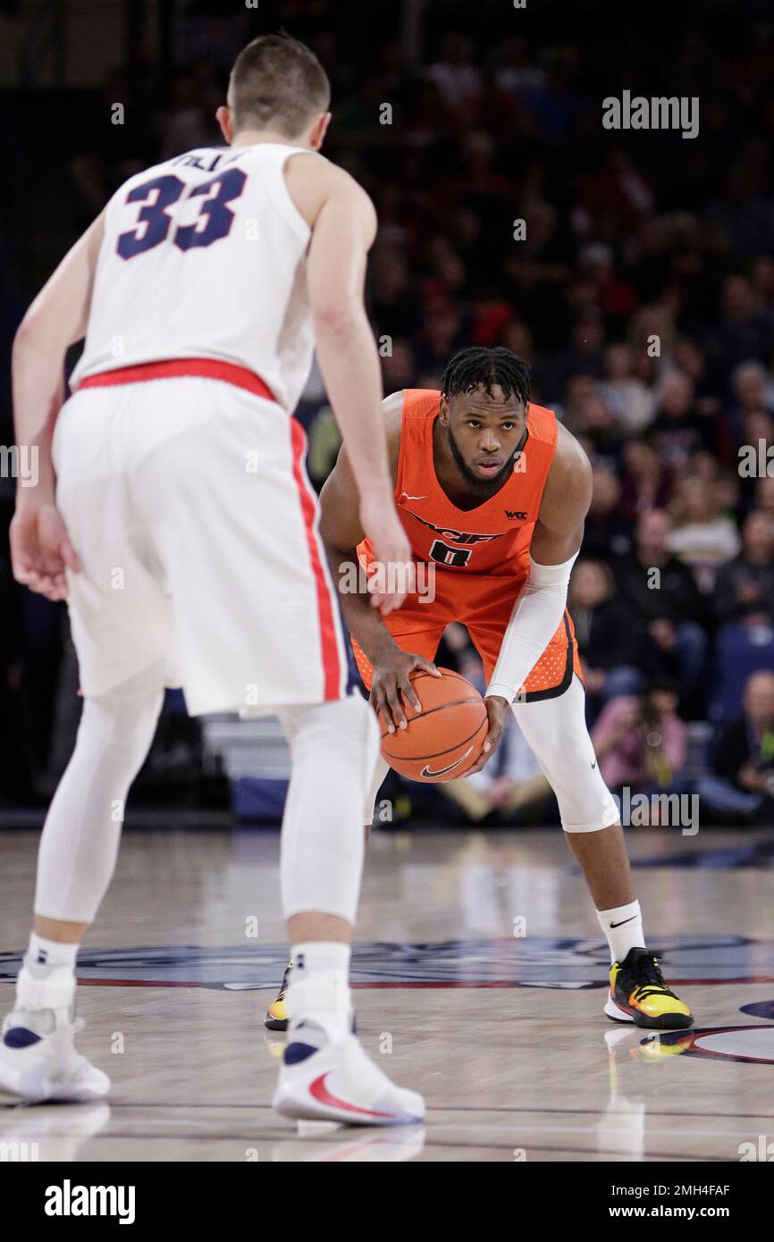 Pacific guard Jahlil Tripp (0) holds the ball while defended by Gonzaga ...
