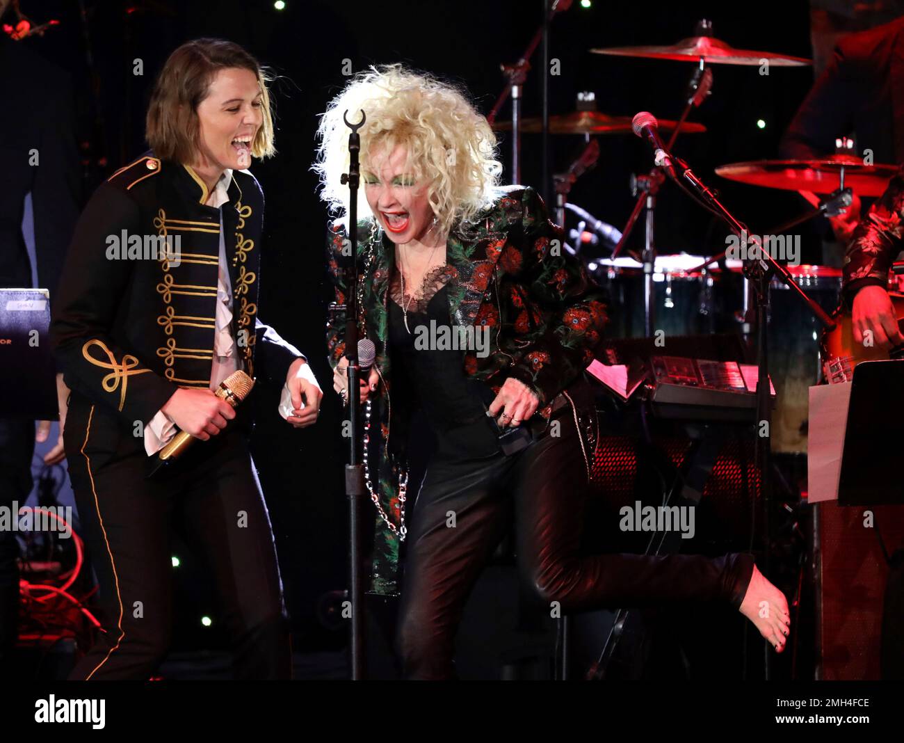 Brandi Carlile, left, and Cyndi Lauper perform on stage at the Pre ...