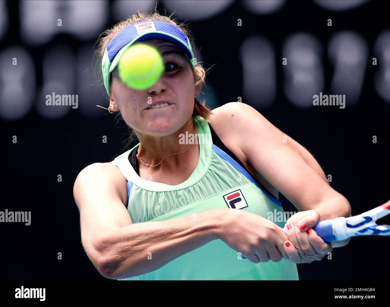 Sofia Kenin of the U.S. makes a backhand return to compatriot Coco ...