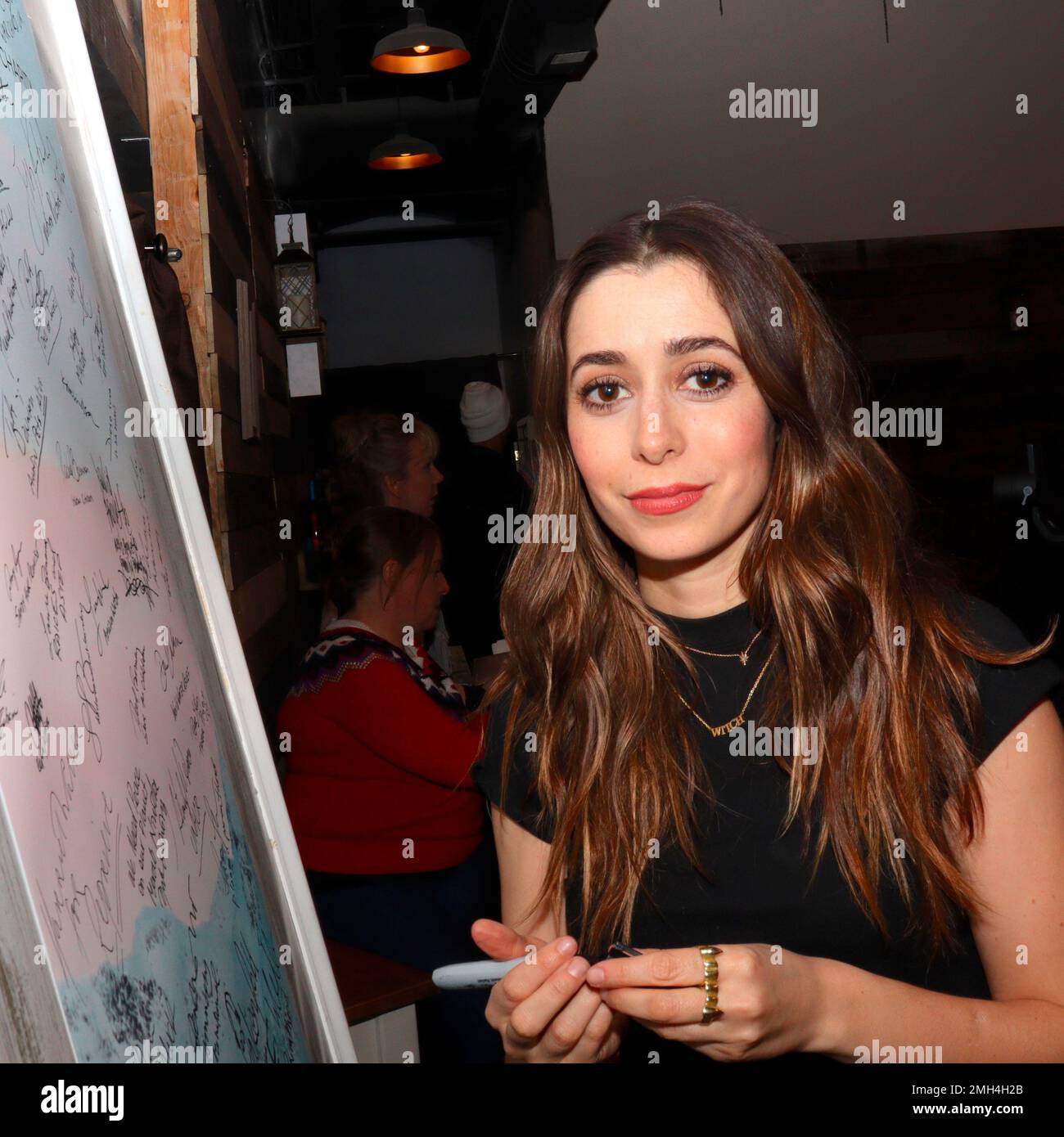 Cristin Milloti Signs the C3TV Charity Wall at the Music Lodge during ...