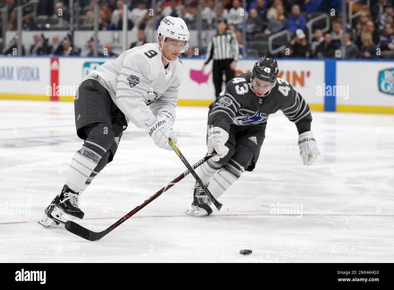 Buffalo Sabres forward Jack Eichel (9) battles for the puck with ...
