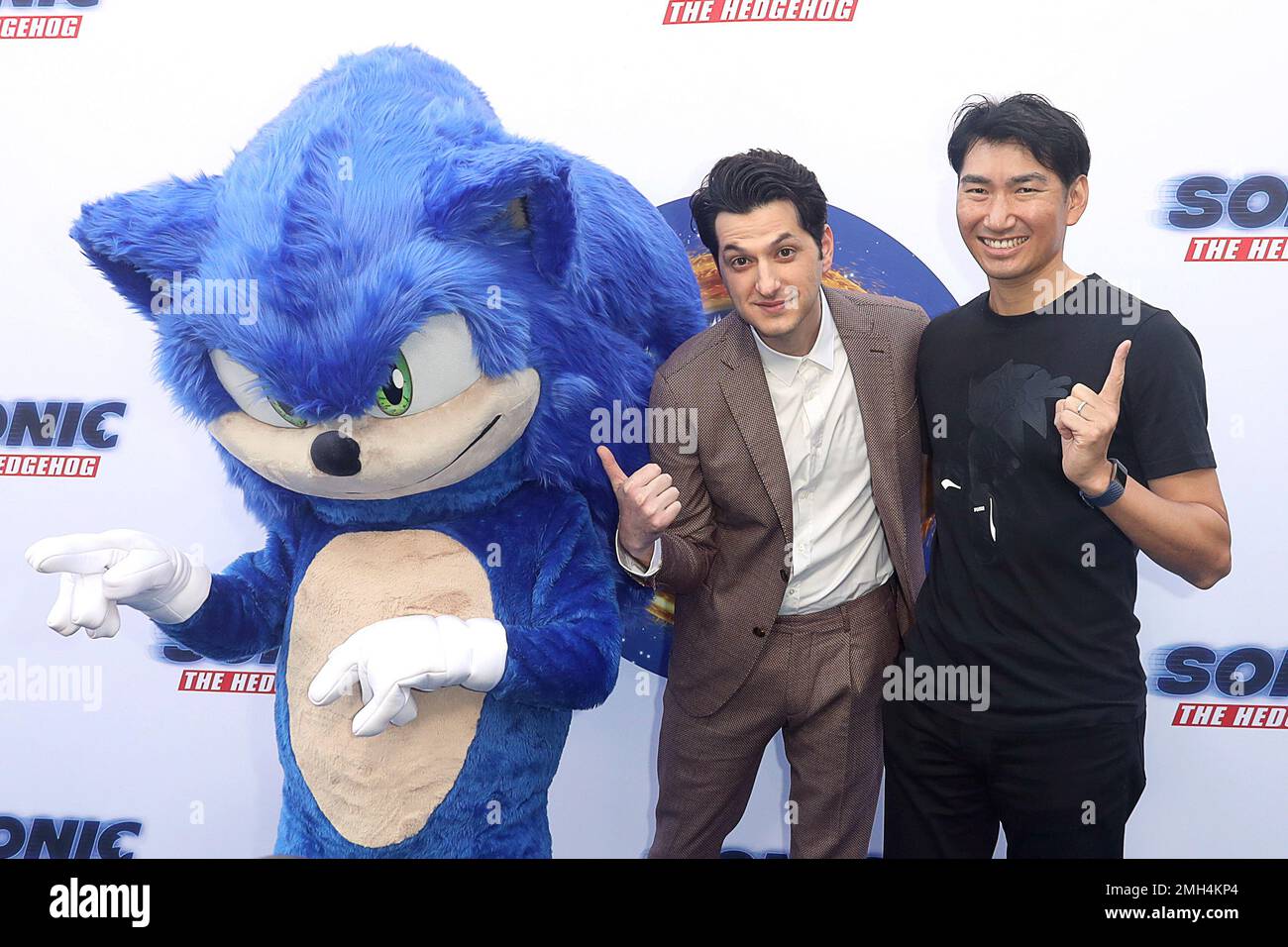 Sonic, from left, Ben Schwartz, and CEO of SEGA Haruki Satomi arrive at ...