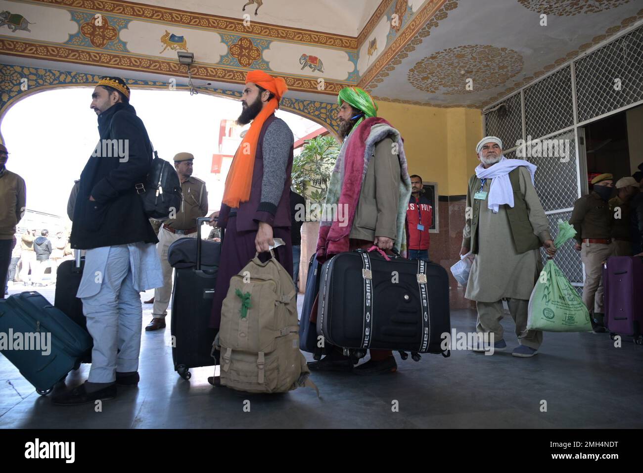 Pakistani pilgrims arrive at the Ajmer railway station to attend the ...