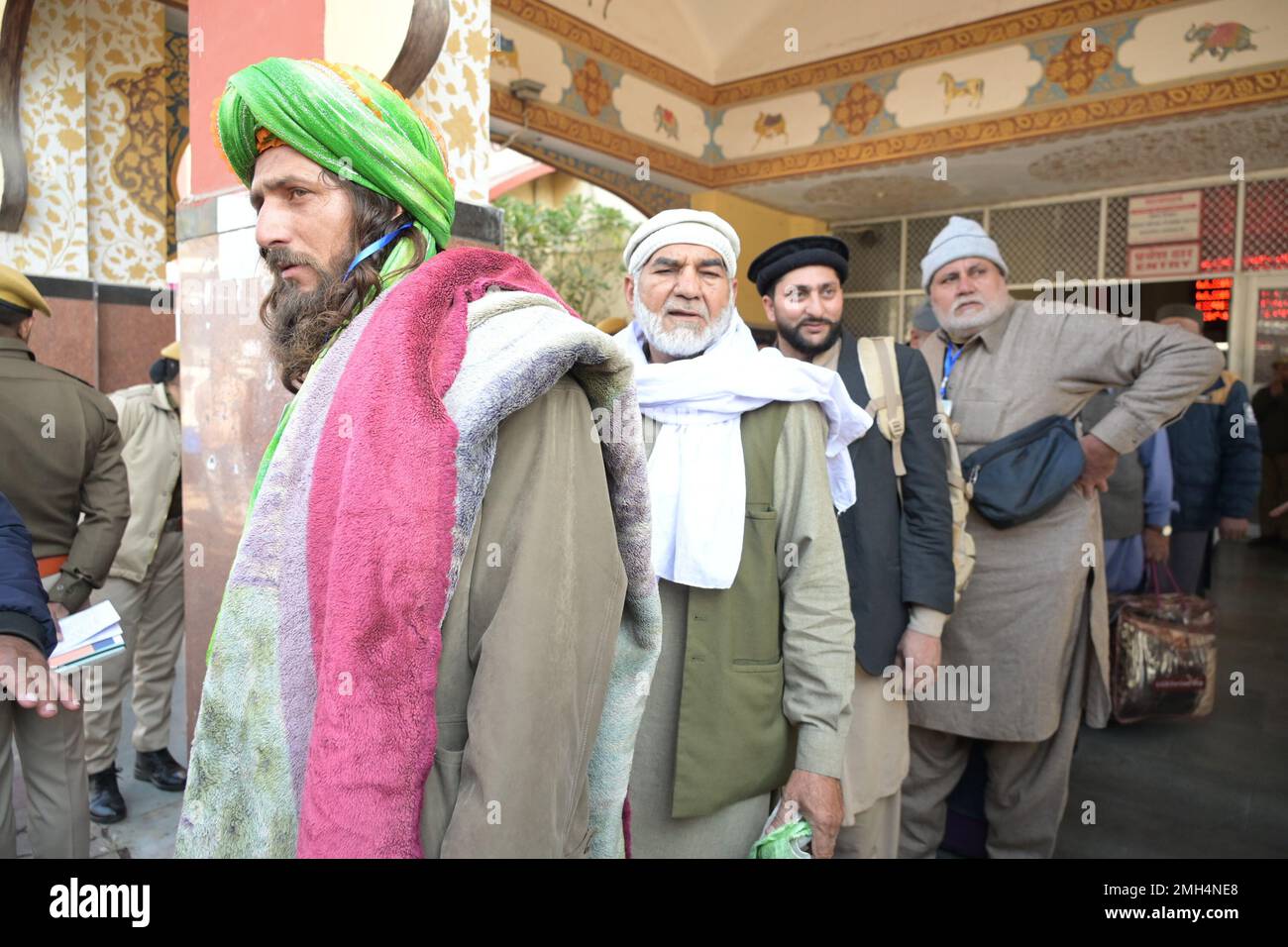 Pakistani pilgrims arrive at the Ajmer railway station to attend the ...