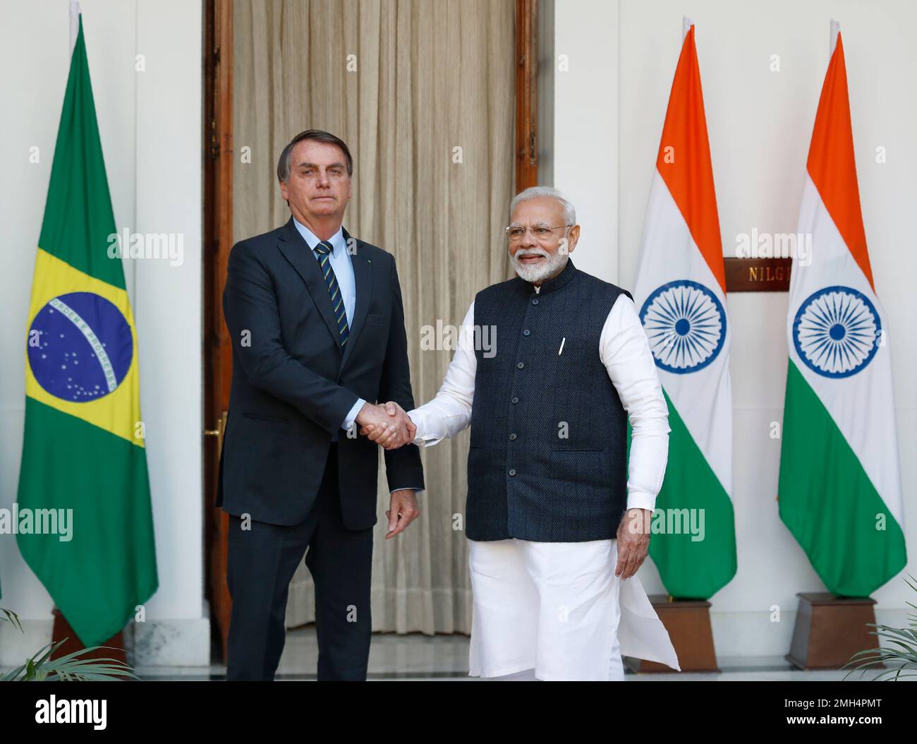 Indian Prime Minister Narendra Modi, right, shakes hand with Brazil's ...