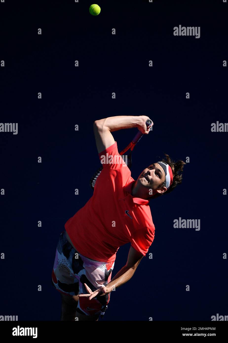 Taylor Fritz of the U.S. serves to Austria's Dominic Thiem during their ...