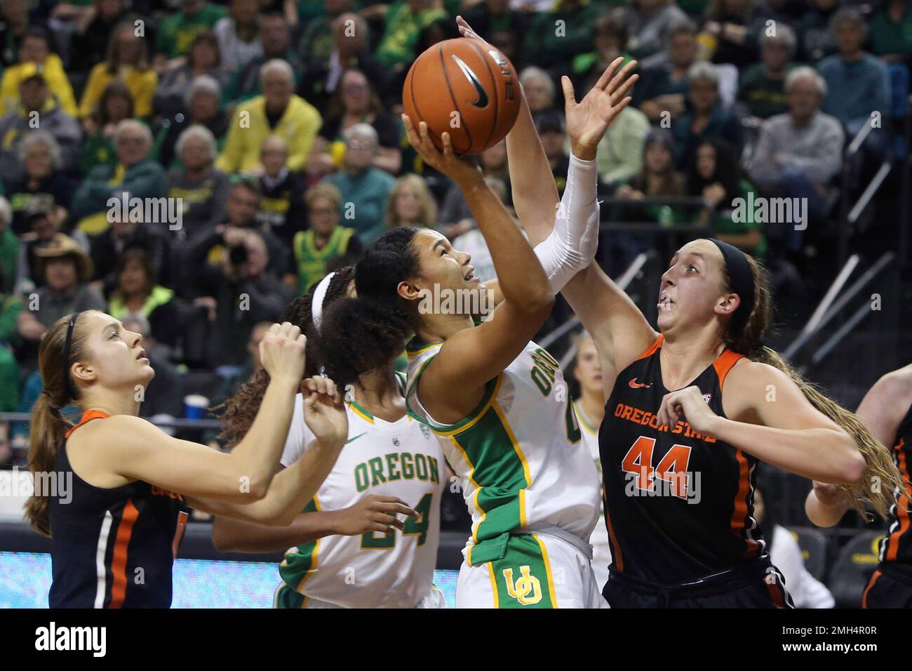 Oregon's Satou Sabally, center, shots between Oregon State, Mikayla ...