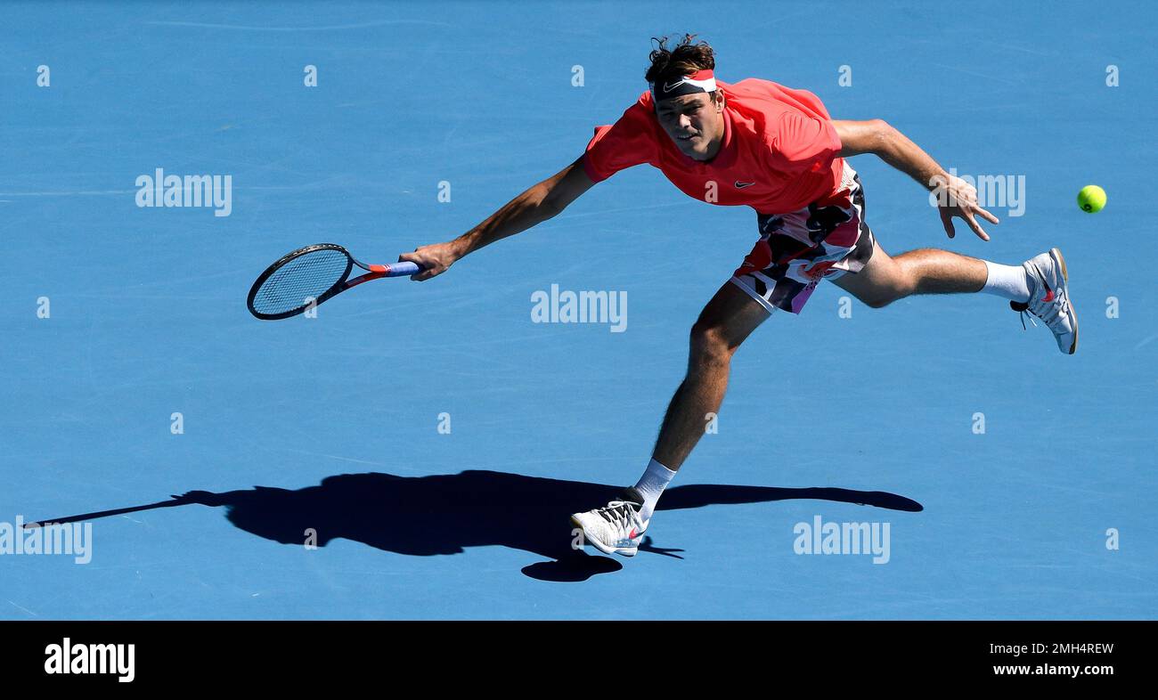 Taylor Fritz of the U.S. makes a forehand return to Austria's Dominic ...