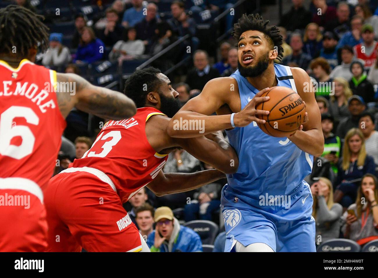 Minnesota Timberwolves center Karl-Anthony Towns, right, drives past ...