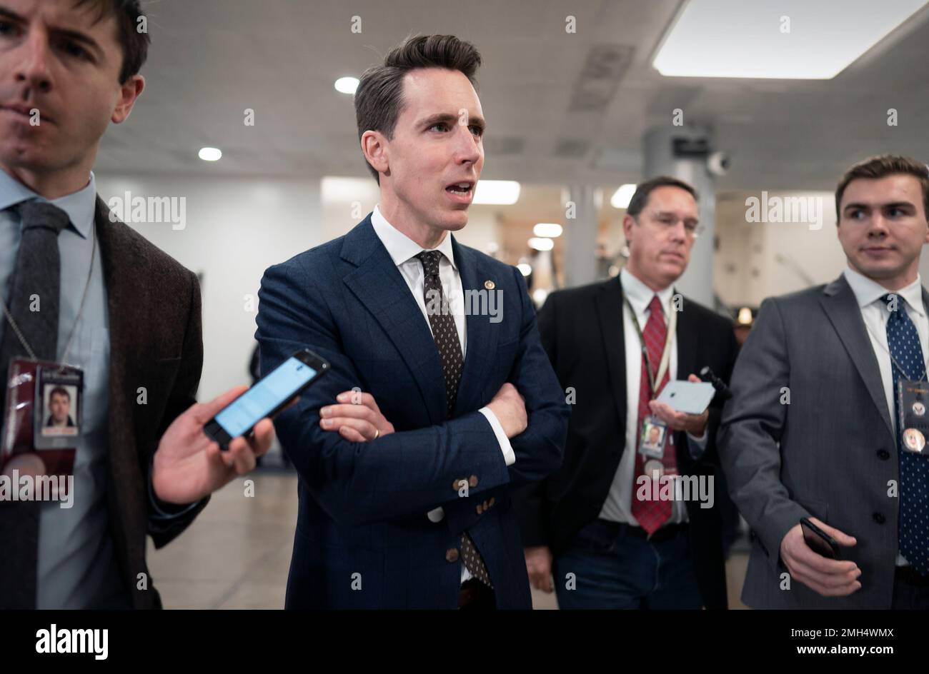 Sen. Josh Hawley, R-Mo., speaks with reporters during a break in the ...