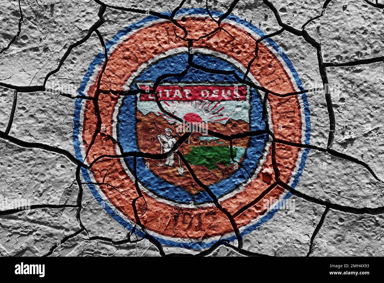 Arizona state Seal flag of United States on a mud texture of dry crack ...