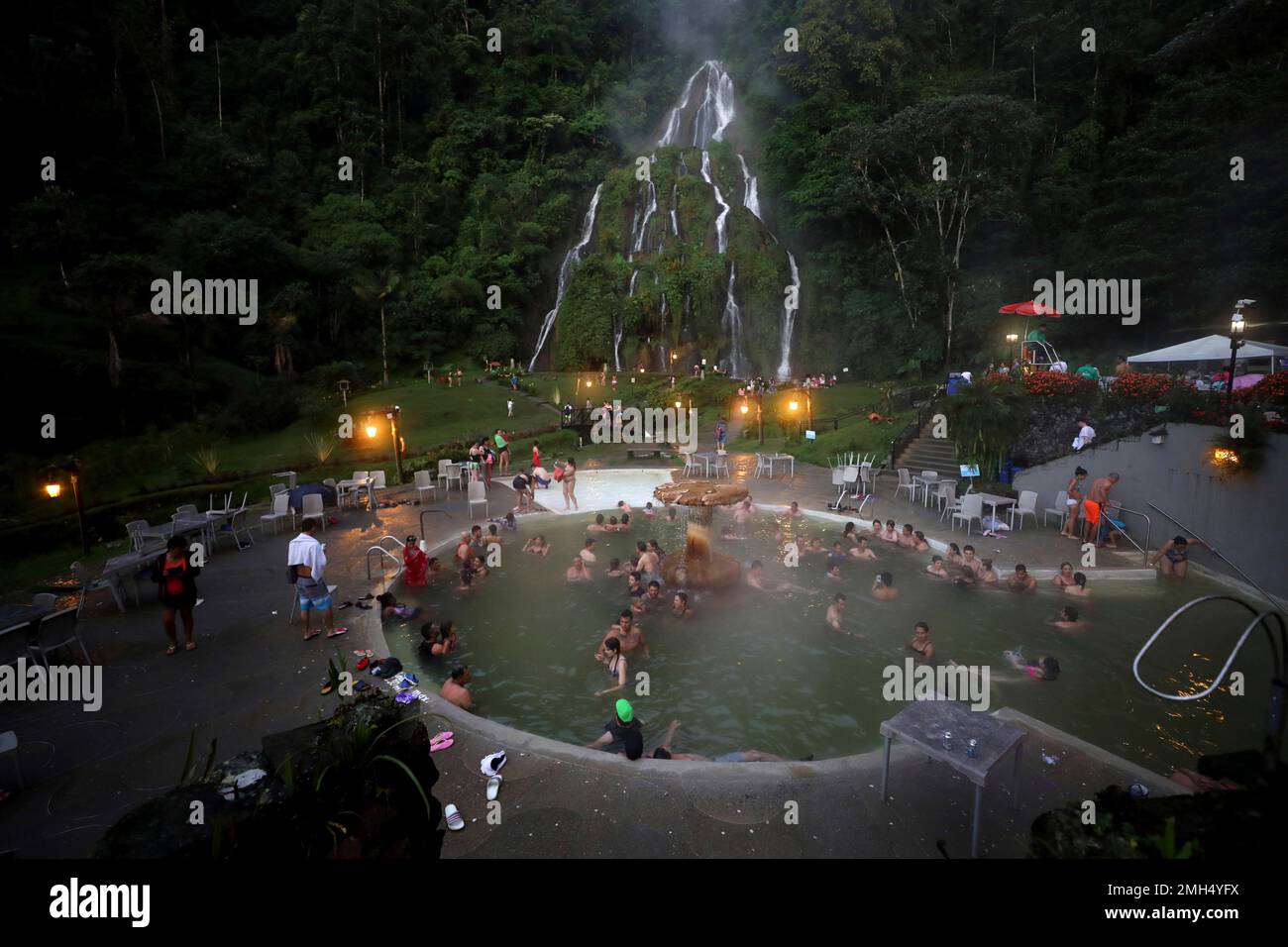 Visitors soak in the "Termales de Santa Rosa" hot springs in Santa Rosa ...