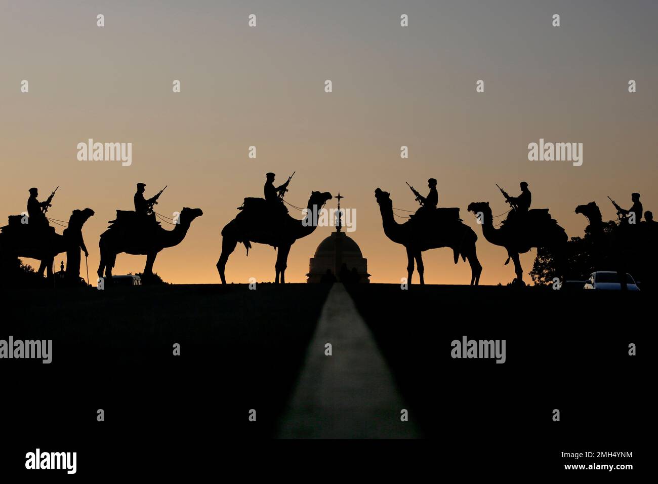 Camel mounted soldiers stand in formation during rehearsals for the ...