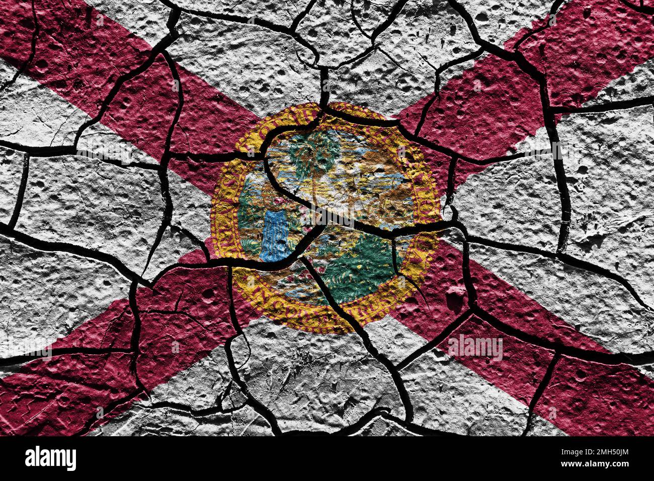 Florida state flag of United States on a mud texture of dry crack on ...