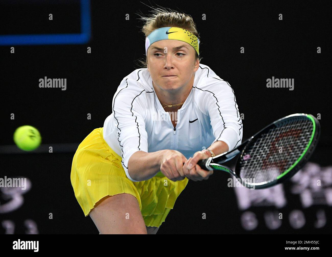 Elina Svitolina of Ukraine makes a backhand return to Lauren Davis of ...